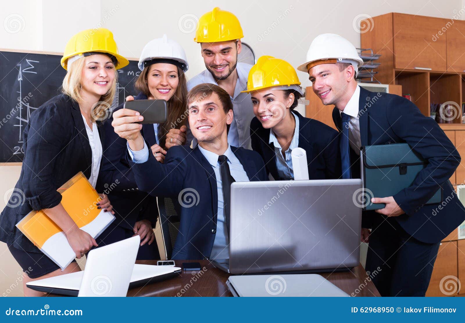 Team of Engineers Posing and Doing Selfie Stock Photo - Image of ...