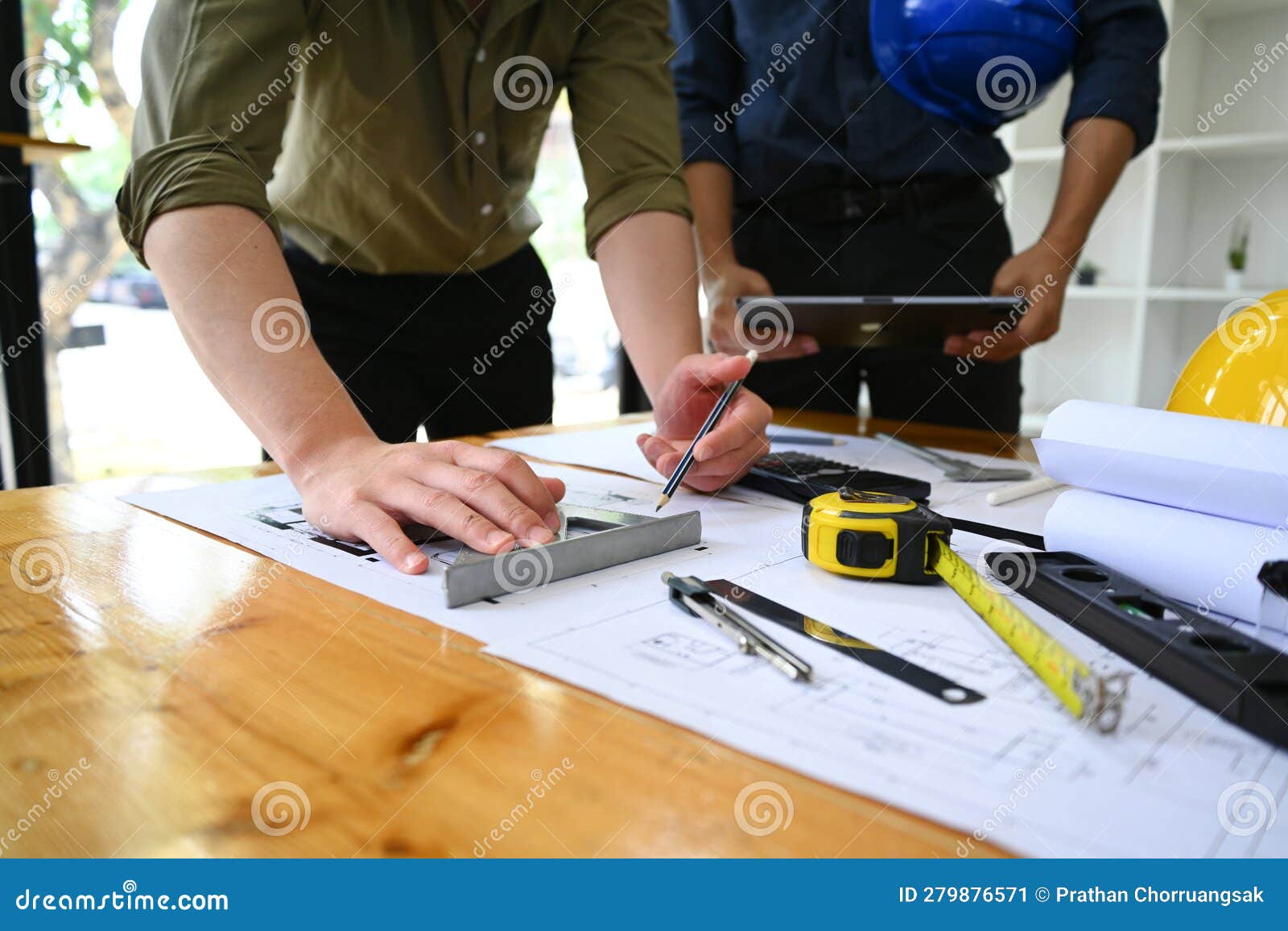 Team of Engineers Standing at Meeting Table, Discussing Construction ...