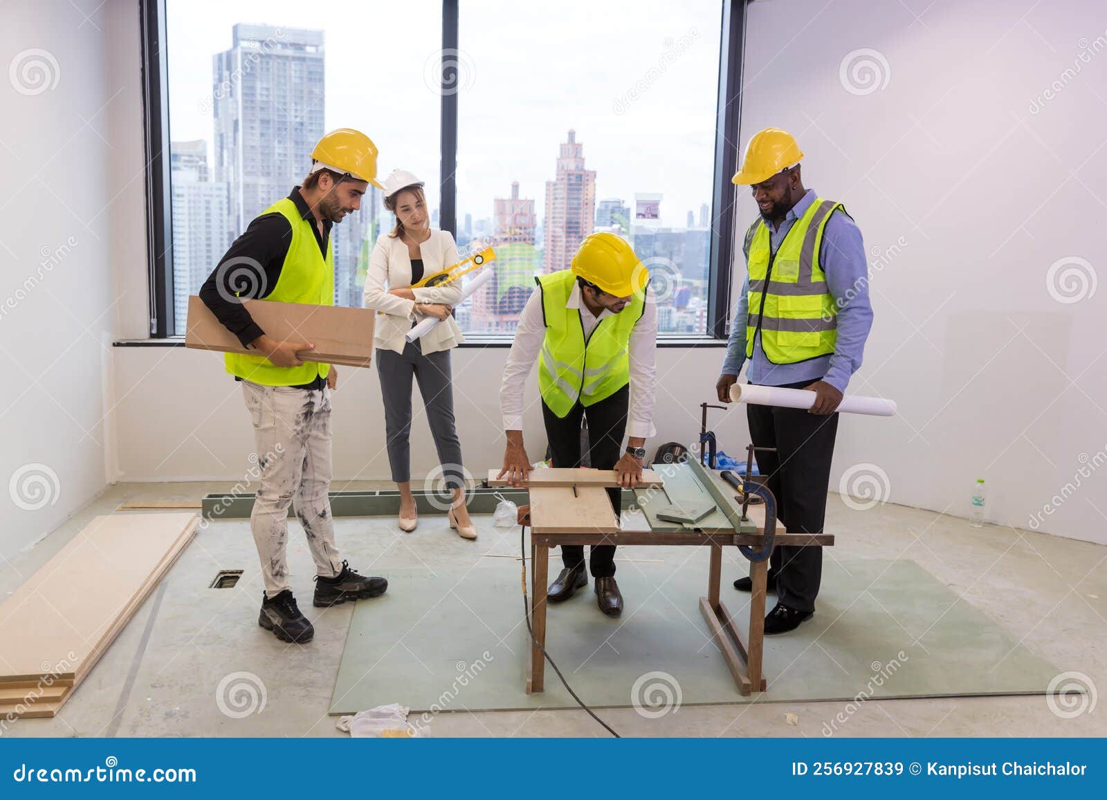 Team Engineers Worki Nbuilding on Constructing Site. Stock Image ...