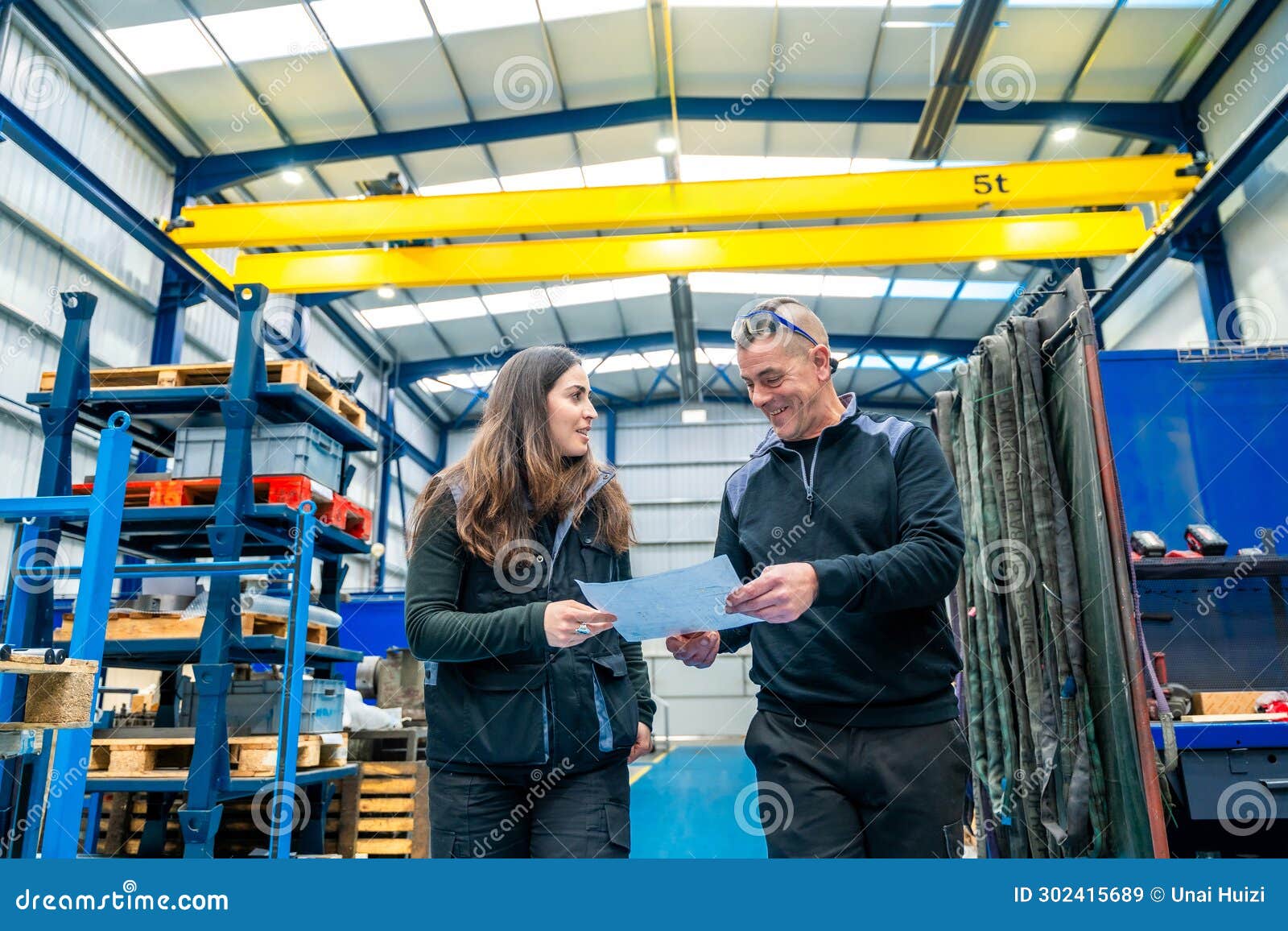 Team of Engineers Working in a Cnc Logistics Factory Stock Image ...