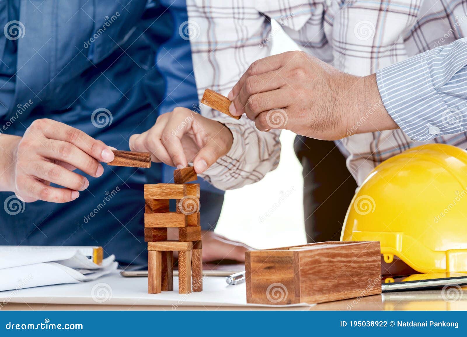 Team Engineers Working with Construction Tools on Table Stock Photo ...