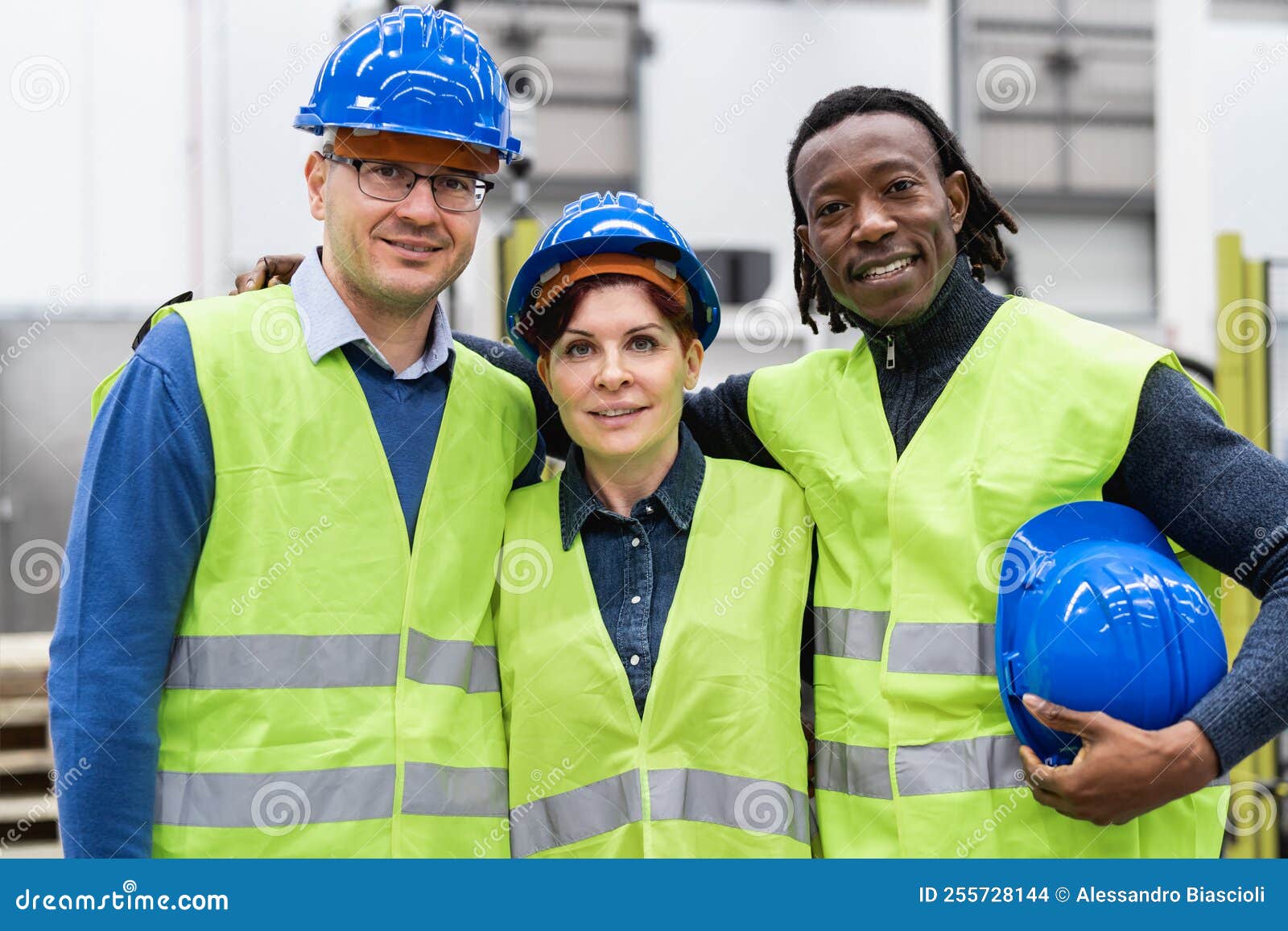 Team of Engineers Working Inside Robotic Factory Stock Photo - Image of ...