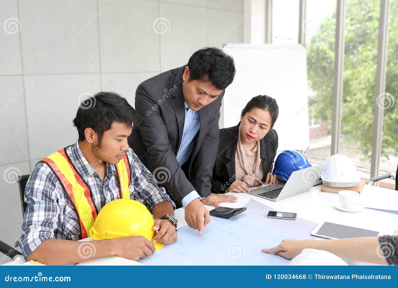 Team Engineers Working Meeting Room at the Office. Team Workers are ...