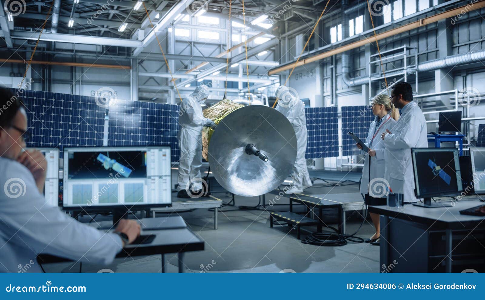 Team of Engineers Working on Satellite Construction, Use Tablet ...