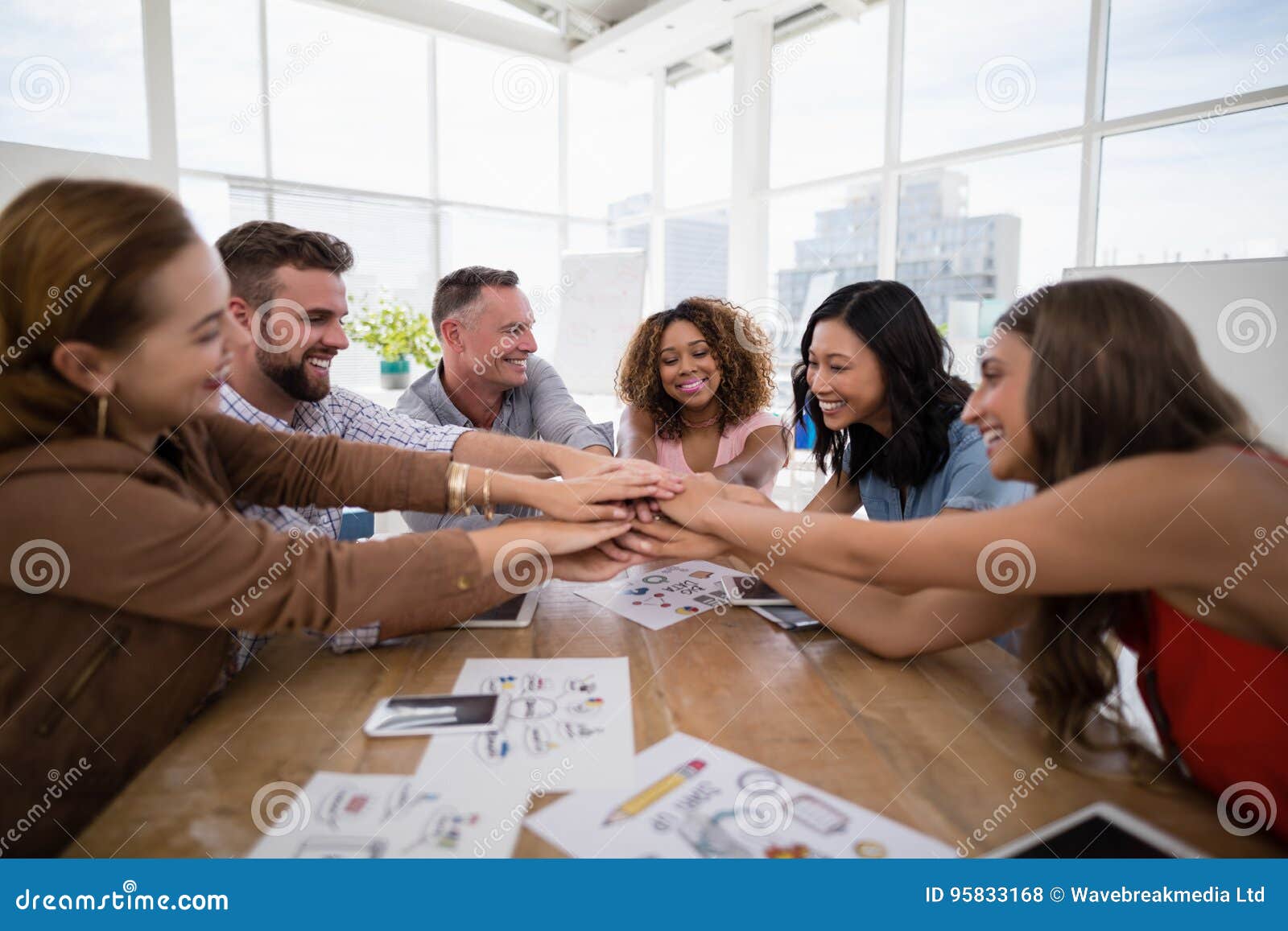 Team of Executives Forming Hand Stack in the Office Stock Photo - Image ...