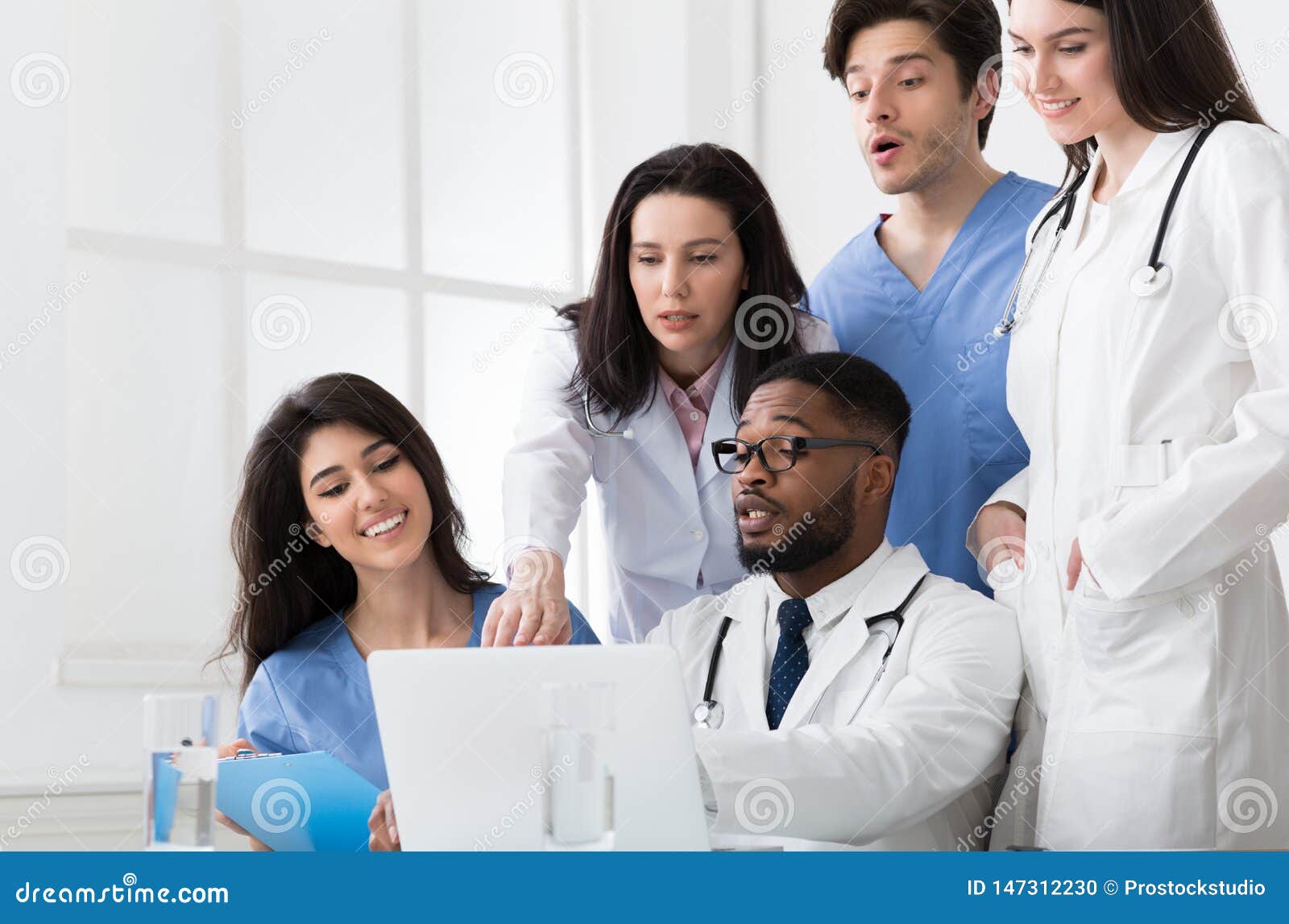 Team of Expert Doctors Examining Medical Reports at Hospital Stock ... Team of Expert Doctors Examining Medical Reports at Hospital Stock ...
