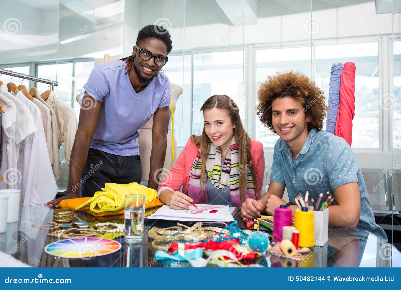 Team of Fashion Designers Sketching Stock Photo - Image of black, dress ...