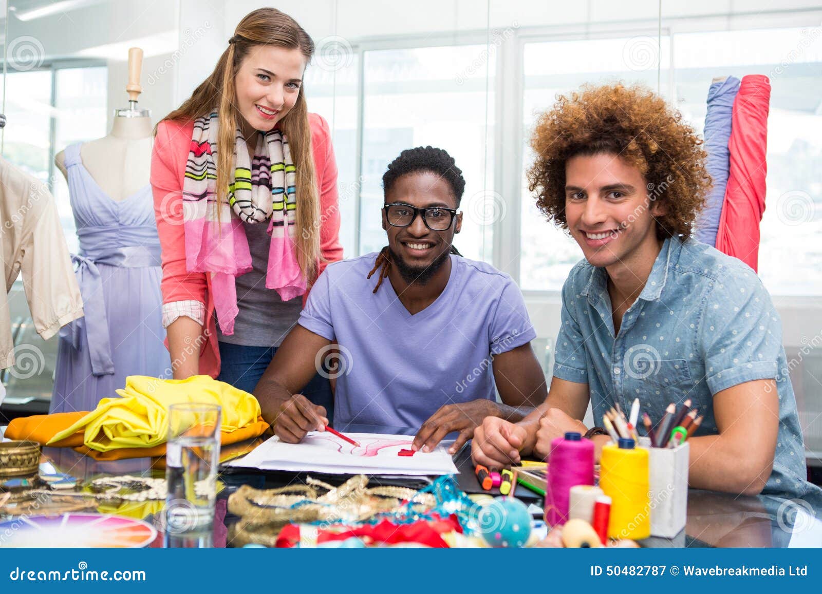 Team of Fashion Designers Sketching Stock Image - Image of cool, adult ...