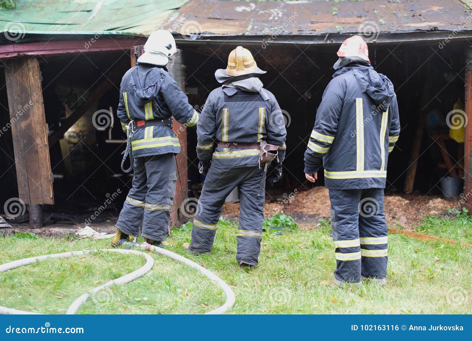Fire brigade after work editorial photo. Image of helmets - 102163116