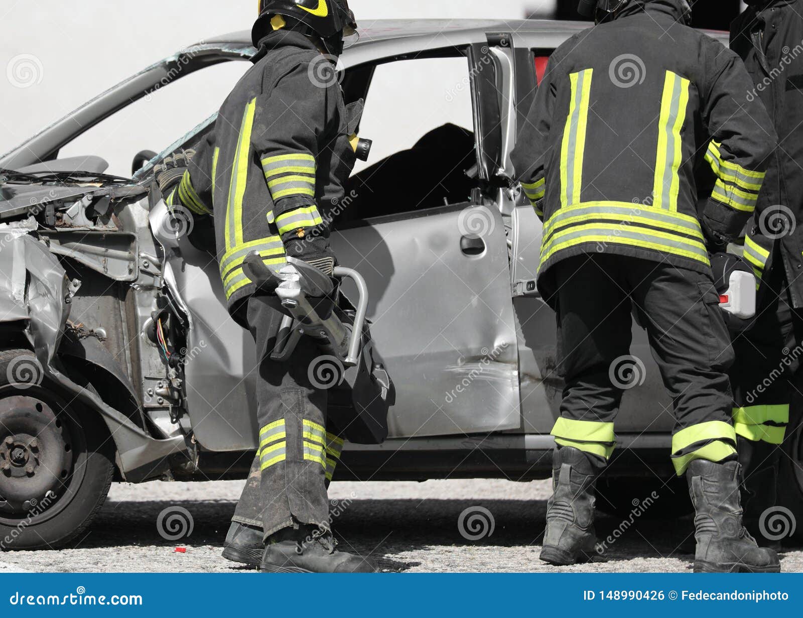 Team of Firefighters with Shears after the Road Accident Stock Photo ...