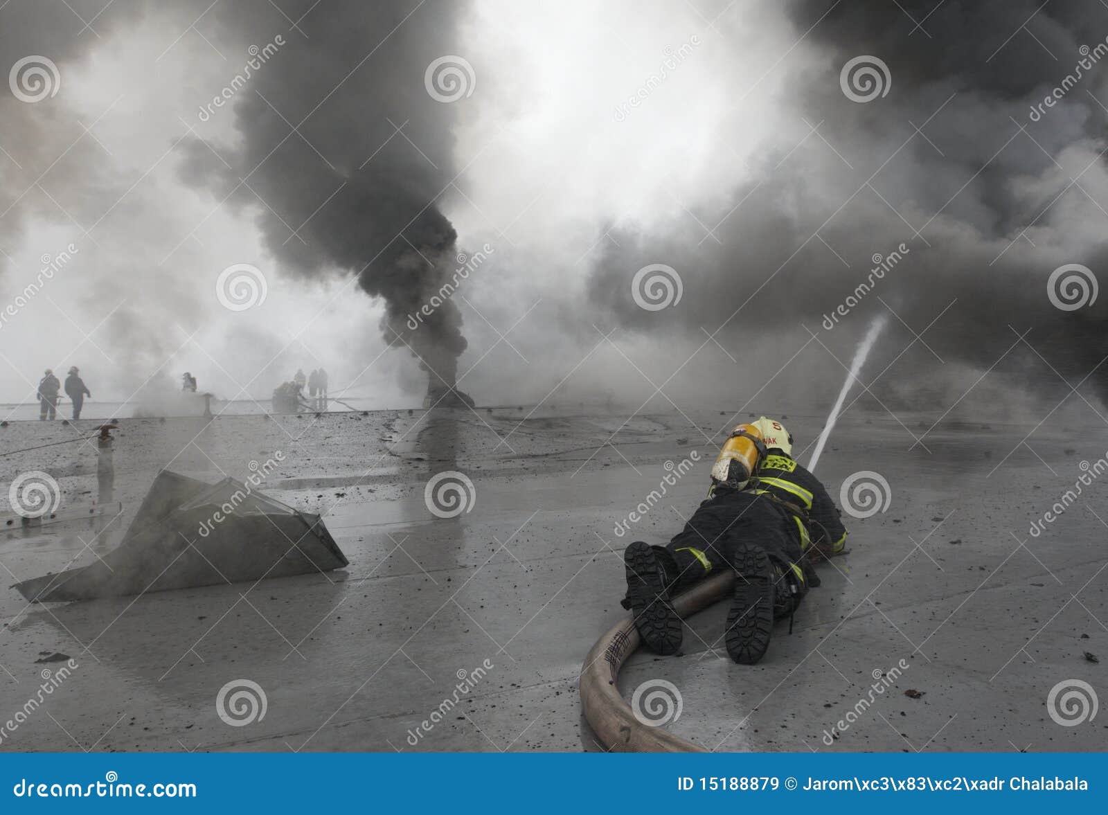 The Team of Firemen Fighting with the Fire Editorial Stock Image ...