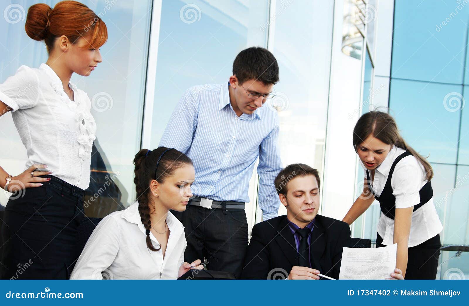 A Team of Five Businesspersons is Working Together Stock Photo - Image ...