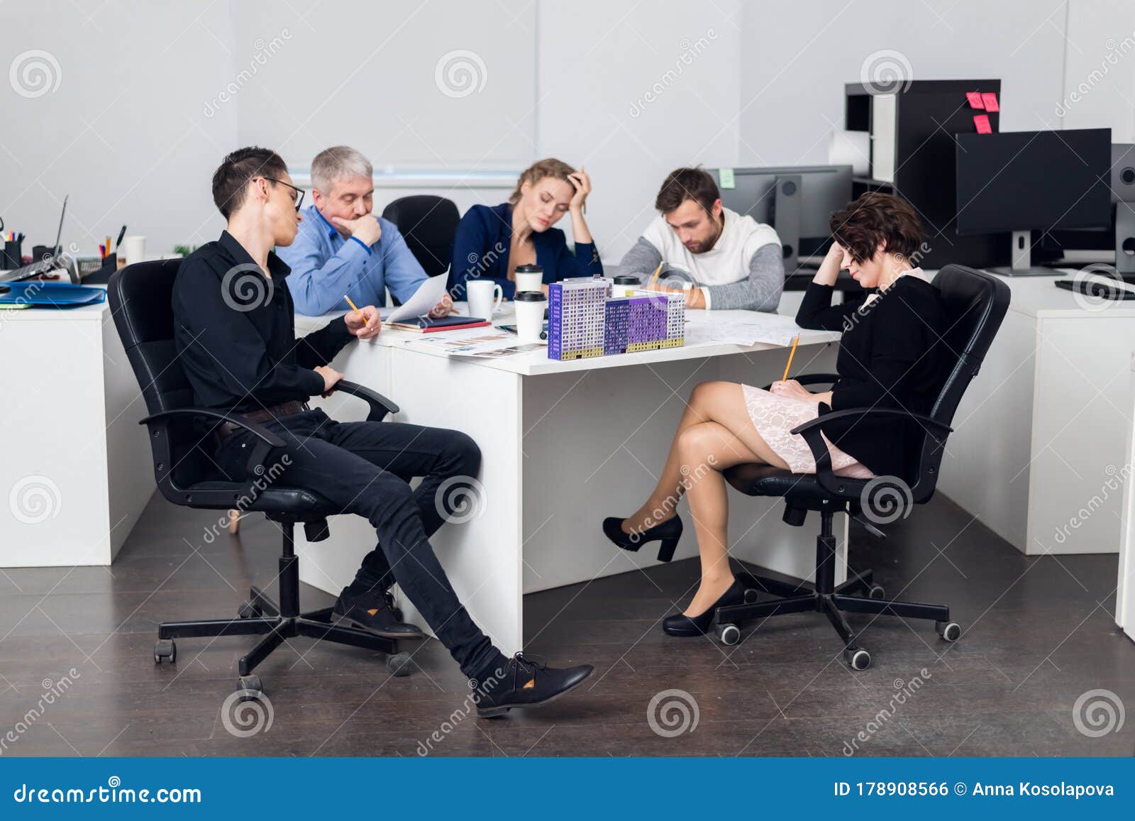 A Team of Five People Having a Meeting in the Office Stock Photo ...