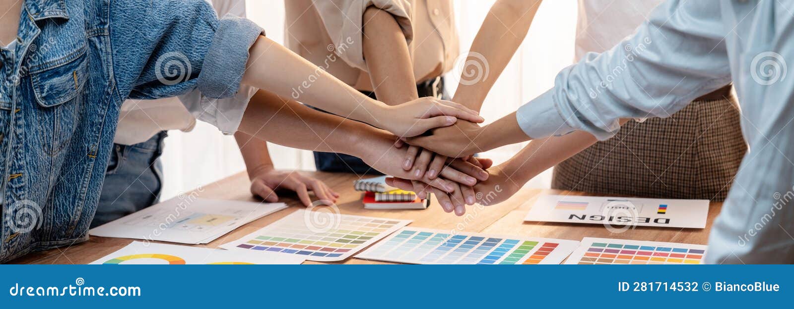 Team of Graphic Designers Building Unity and Solidarity. Scrutinize ...