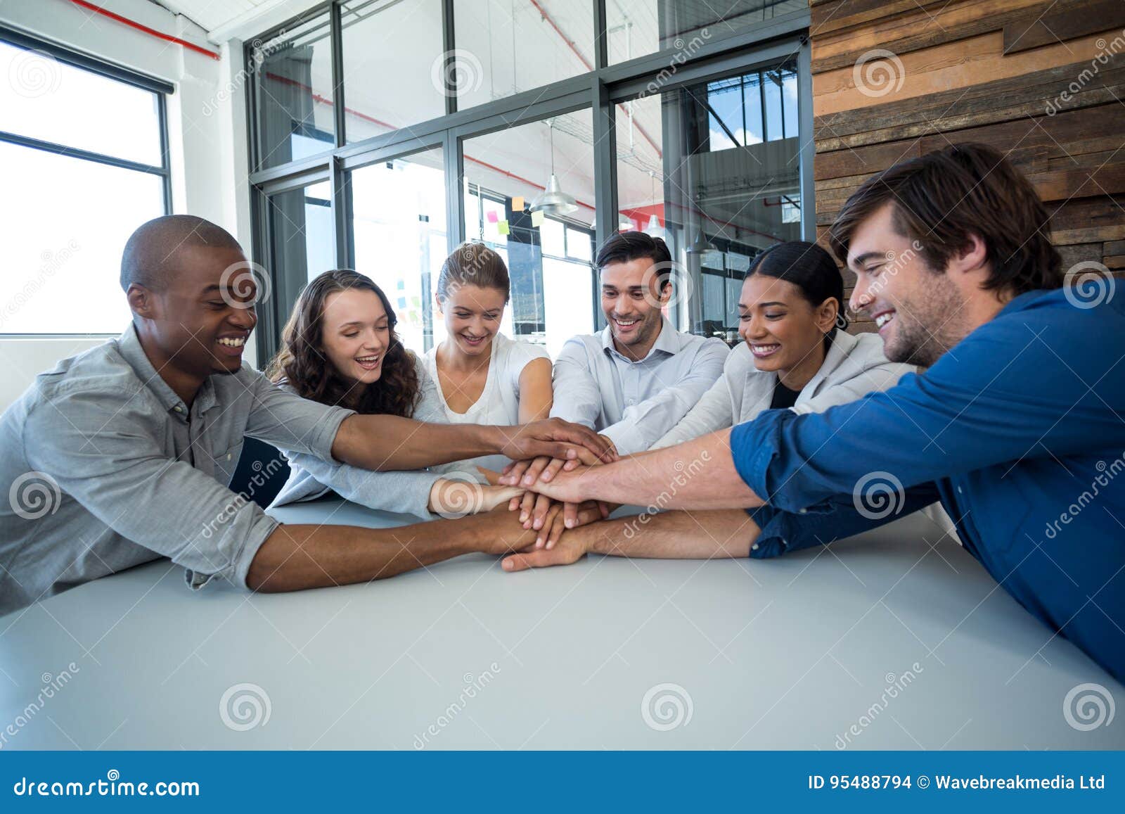 Team of Graphic Designers Forming Handstack Stock Photo - Image of ...