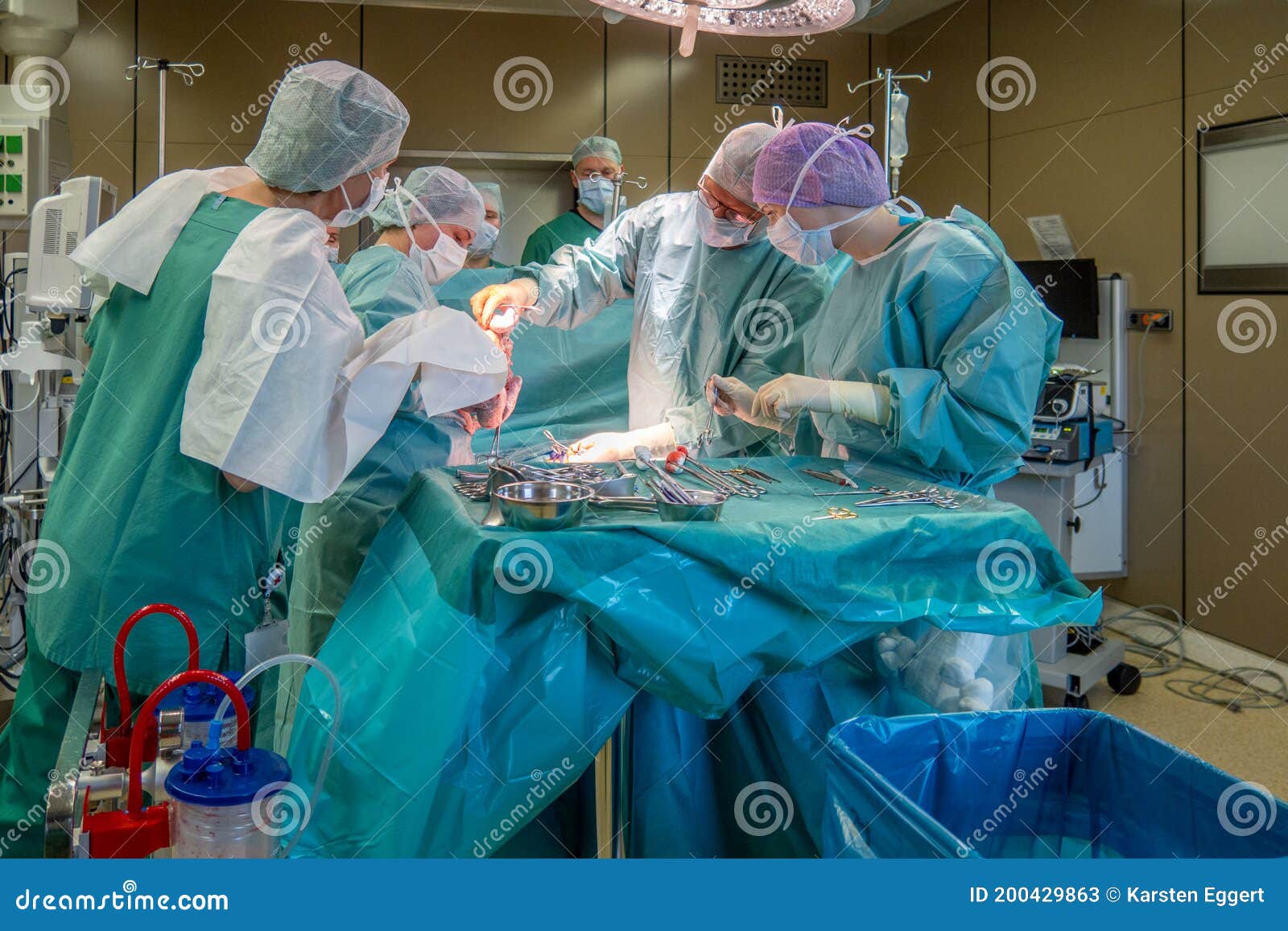 Team of Gynecologists Performs a Caesarean Section in an Operating Room ...