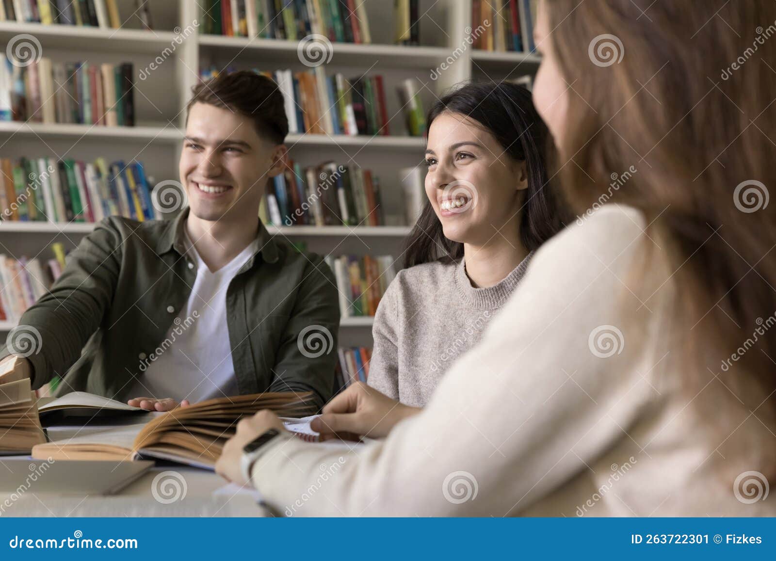 Team of Happy Students Discussing Class Project in Library Stock Image ...
