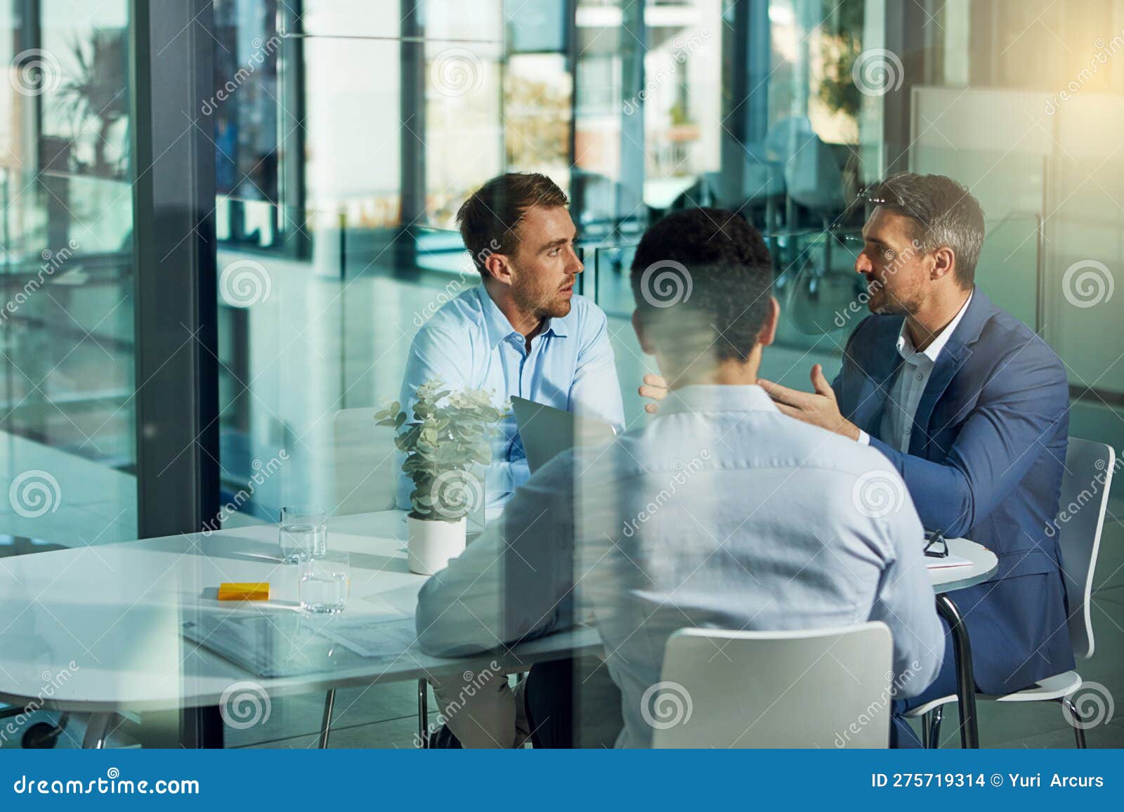 The Team Hard at Work. Businessmen Having an Office Meeting. Stock ...