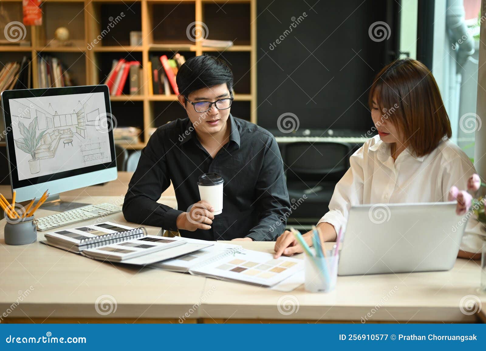 Team of Interior Designers Sharing Idea, Selecting Colors for Building ...