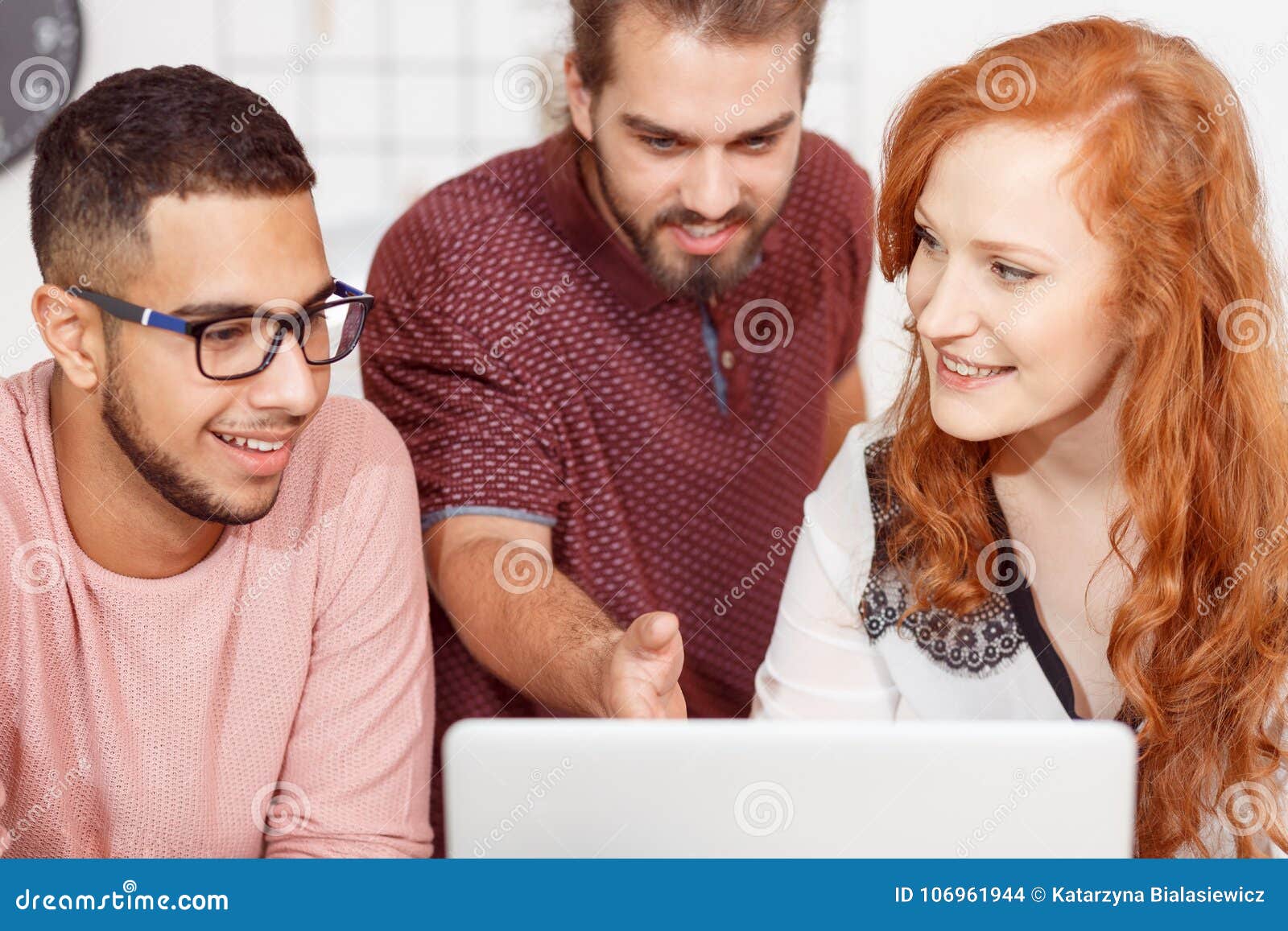 Team working on laptop stock photo. Image of design - 106961944
