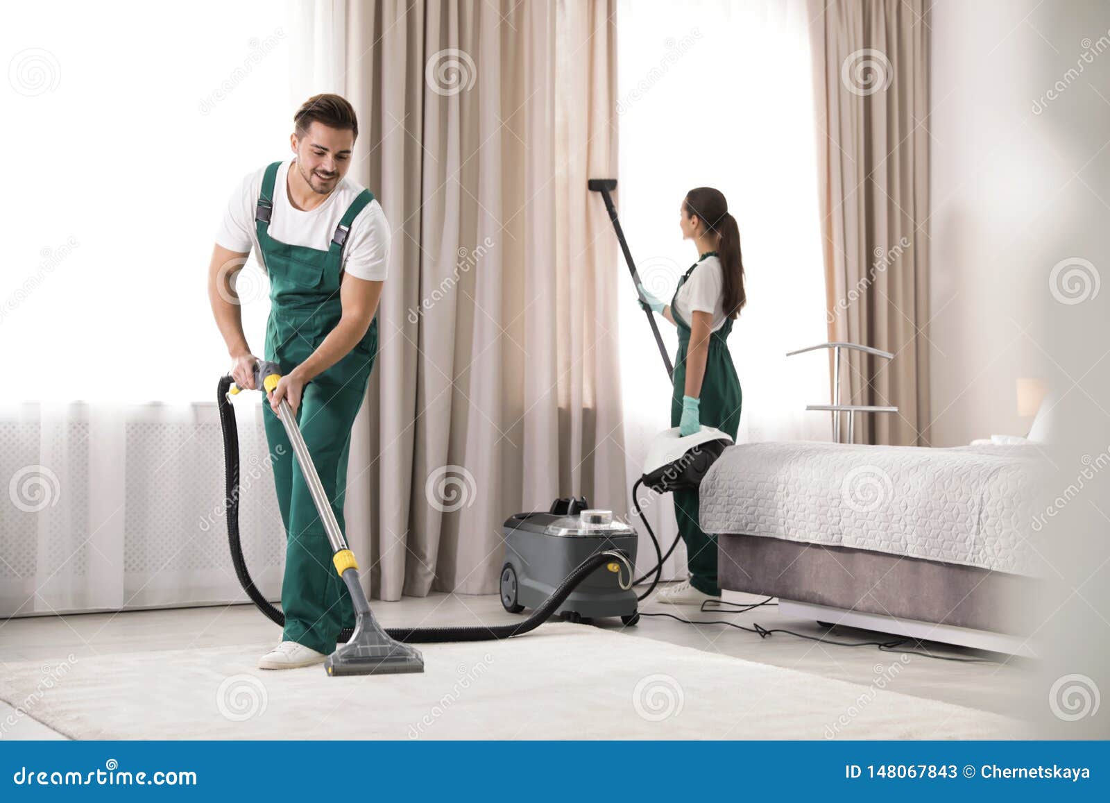 Team of Janitors Cleaning Bedroom with Equipment Stock Image - Image of ...