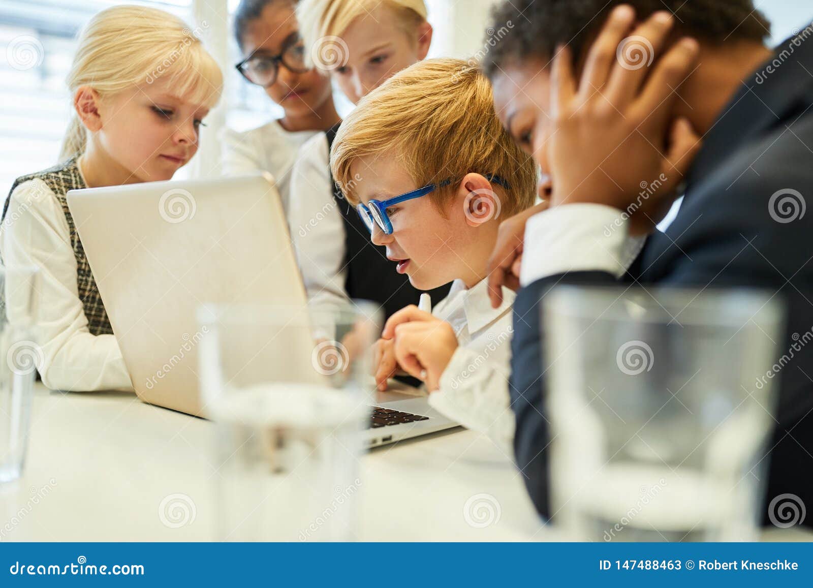 Team at Laptop Computer Brainstorming Stock Image - Image of kids ...
