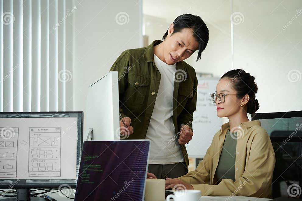 Team Leader Talking To Programmer Stock Photo - Image of coding ...