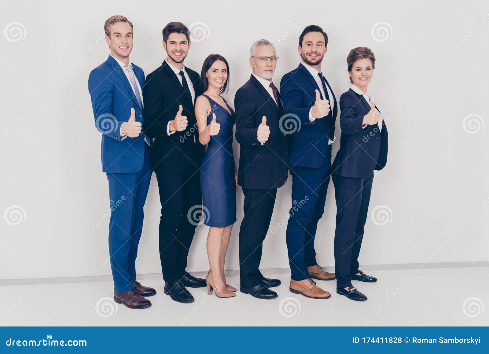 Team Leaders. Top Successful Managers Showing Thumbs Up Stock Photo ...