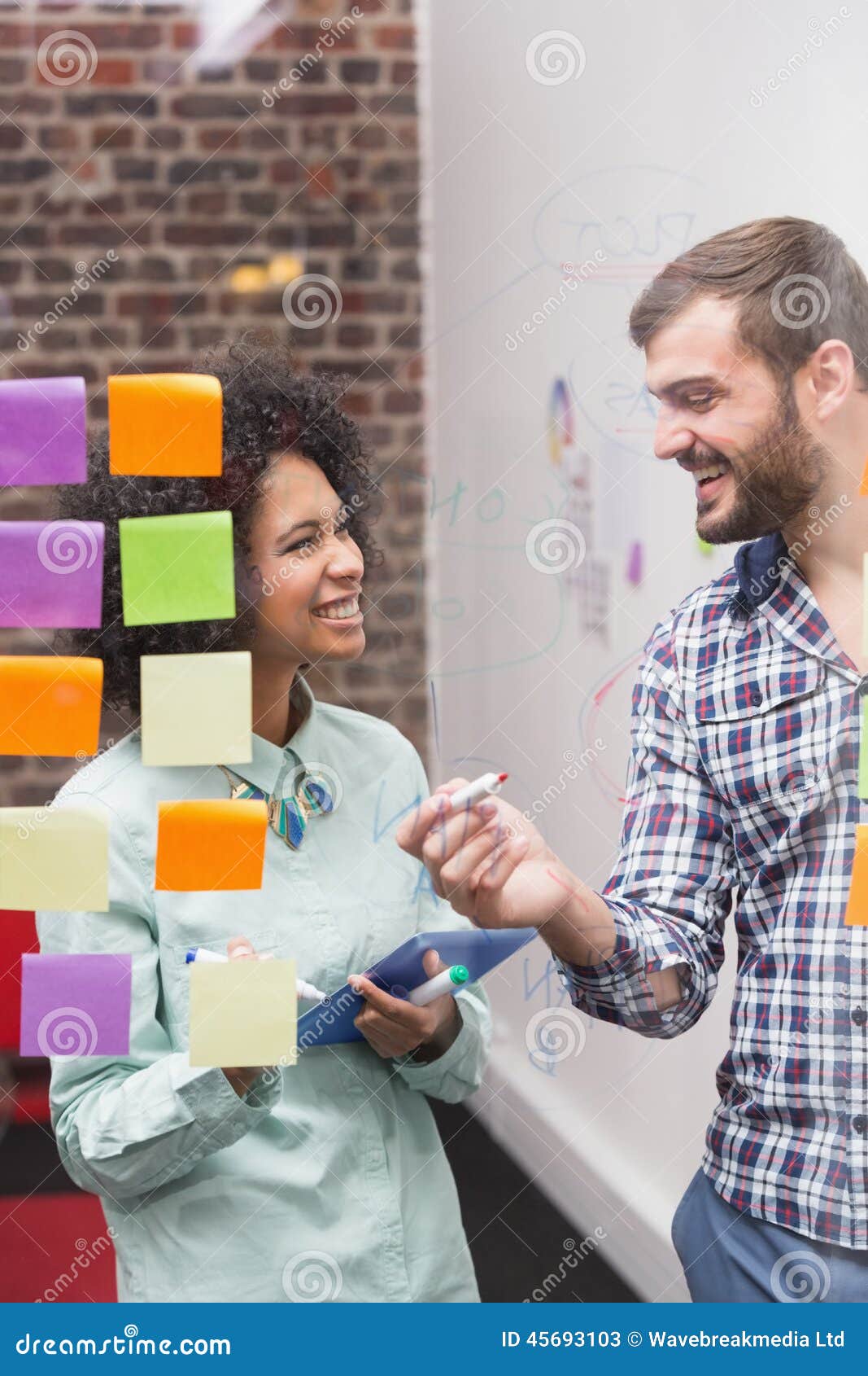 Team Looking at Sticky Notes on Window Stock Image - Image of ...