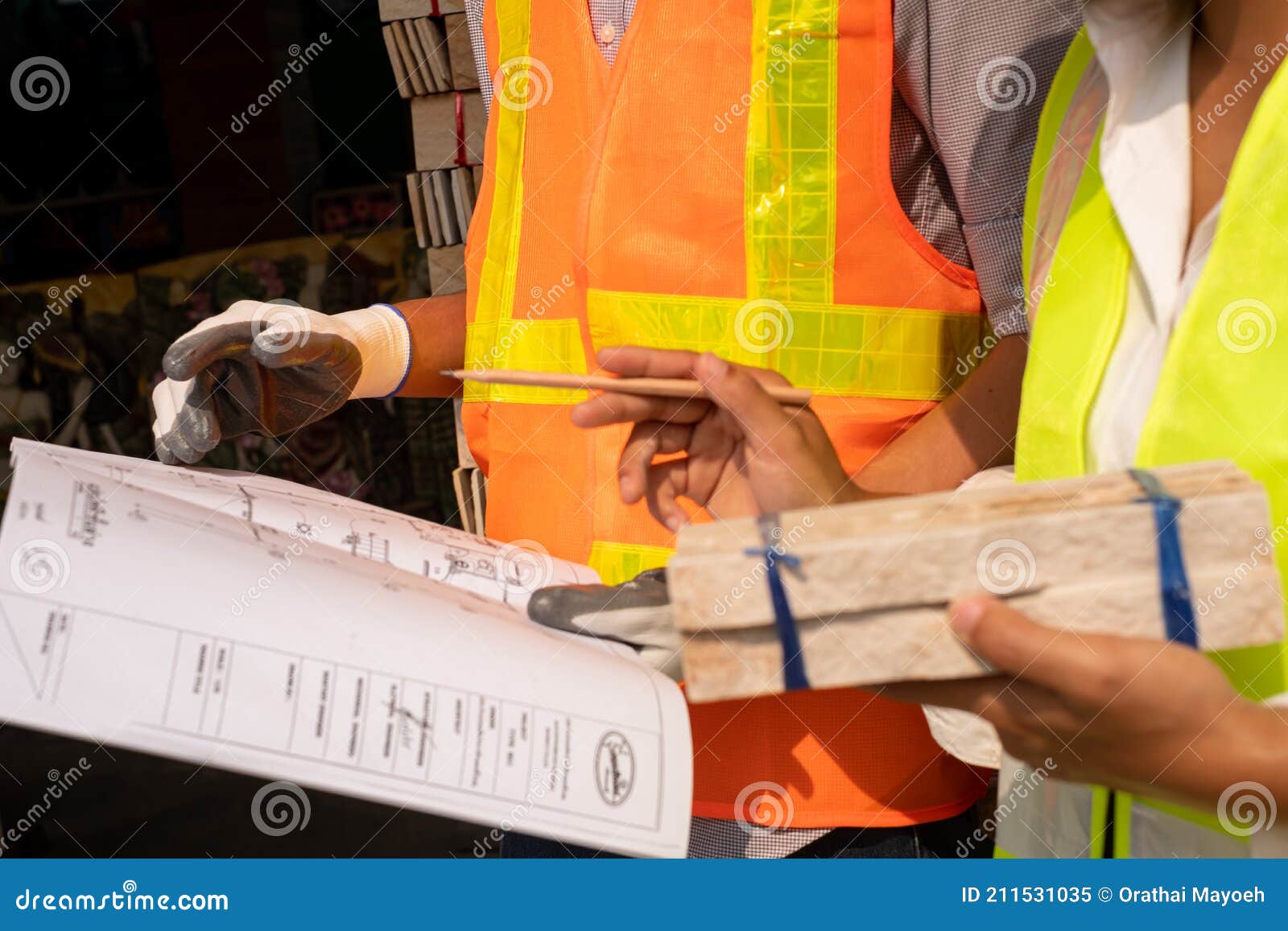 A Team of Male and Female Engineers or Architects is Exploring and ...