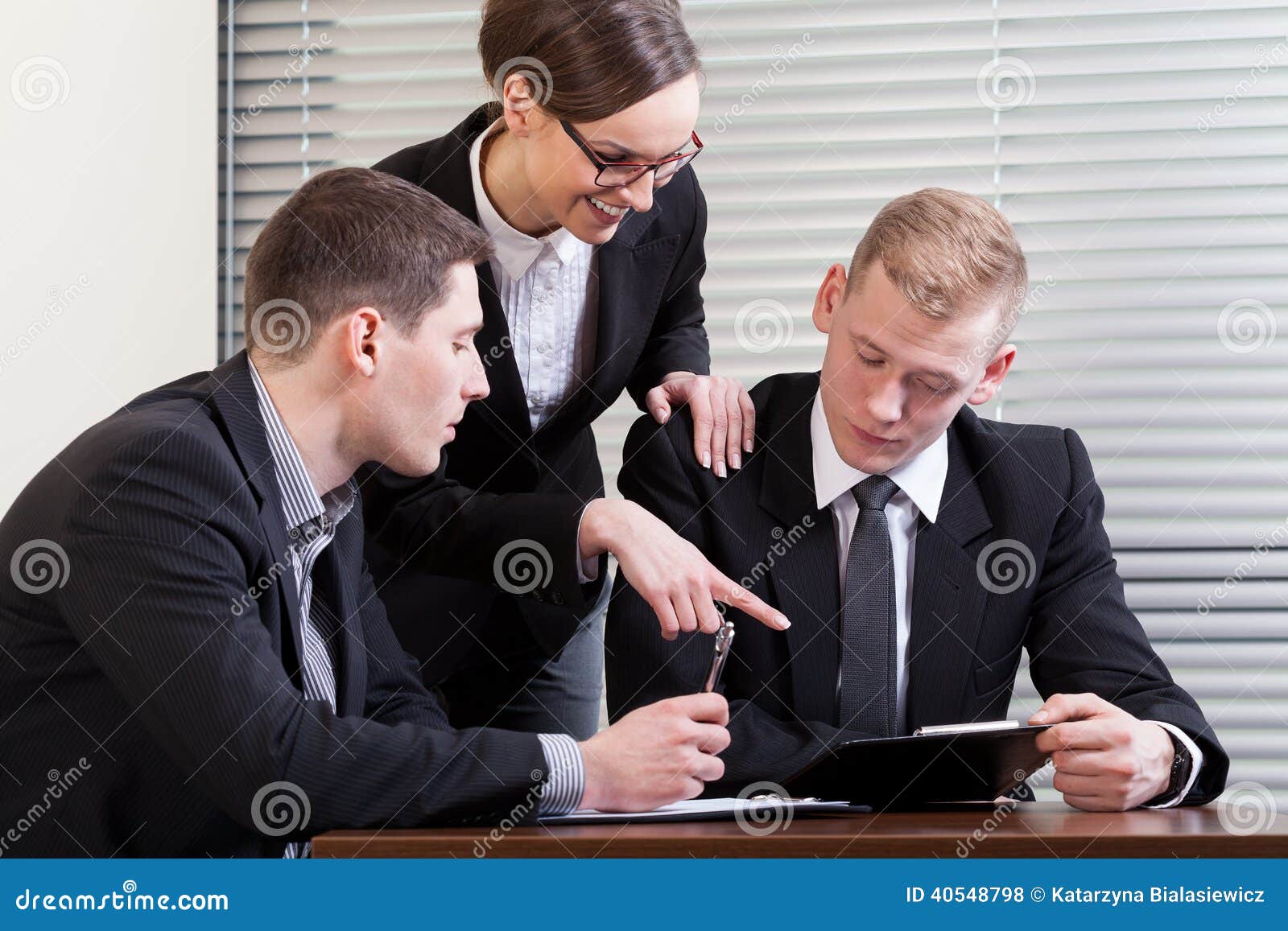 Team Manager and Workers during Work Stock Photo - Image of discussion ...