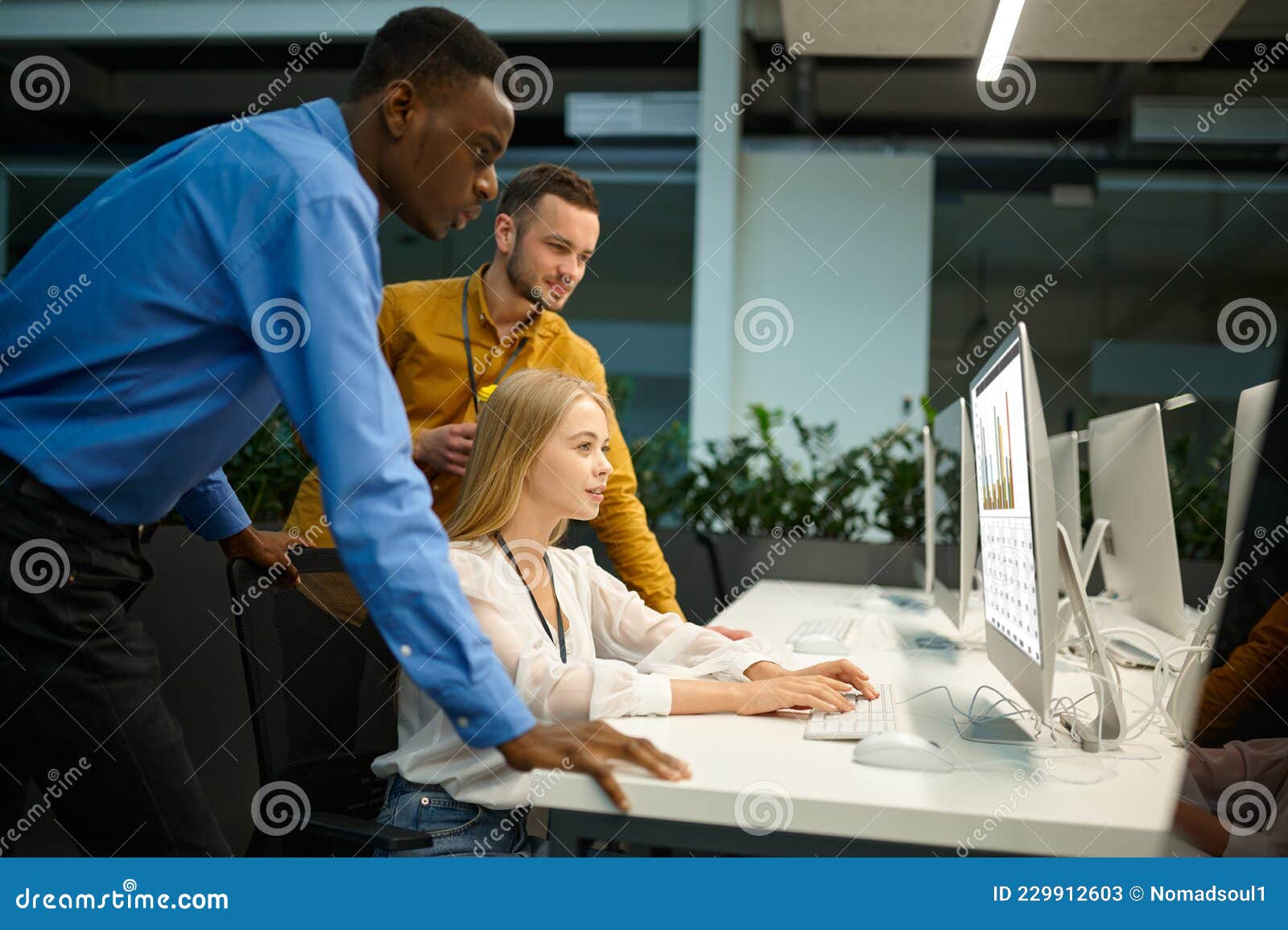 Team of Managers Looks on Screen in it Office Stock Image - Image of ...