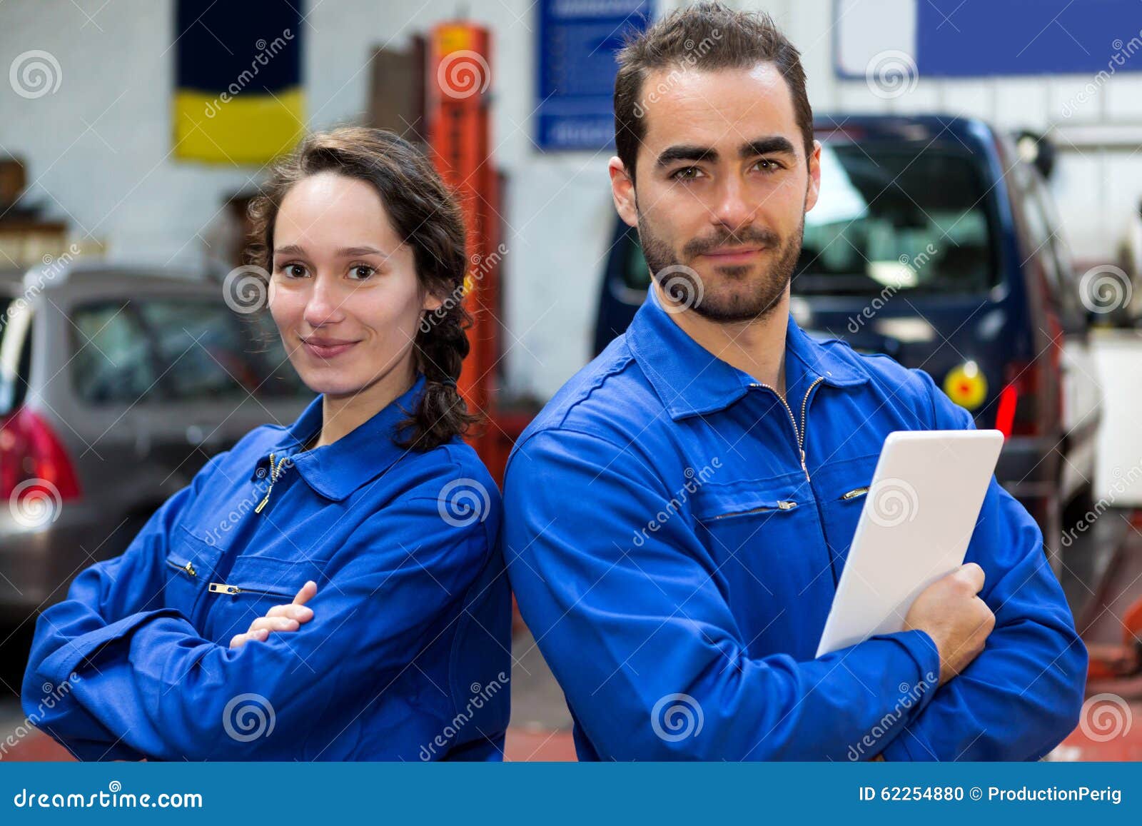 Team of Mechanics Working at the Garage Stock Photo - Image of vehicle ...
