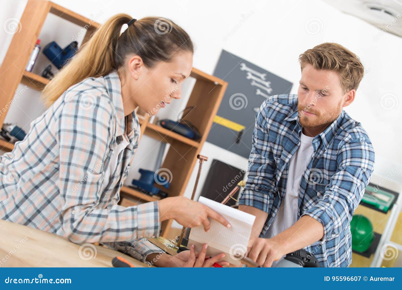 Team Mechanics Working Together at Repair Garage Stock Image - Image of ...