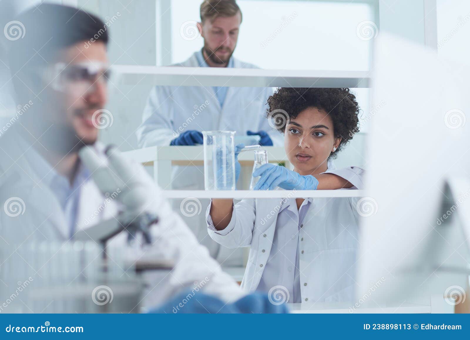 Team of Medical Research Scientists Working on Generation Experimental ...