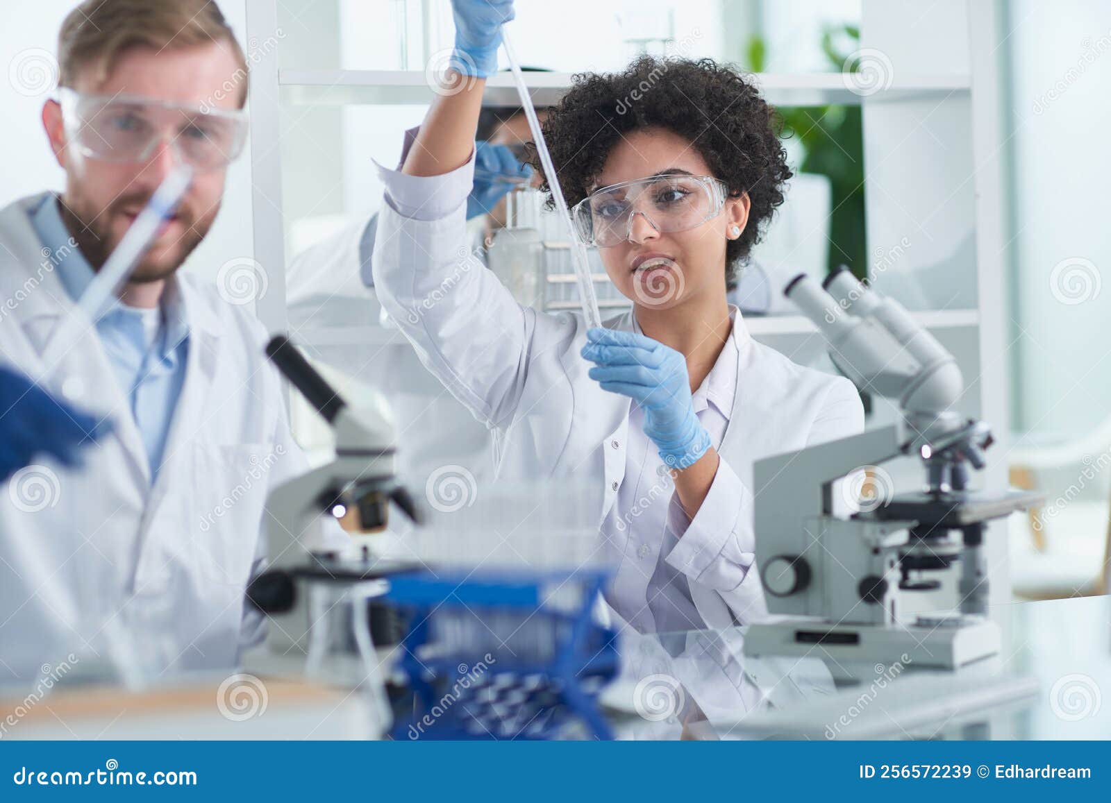 Team of Medical Research Scientists Working on Generation Experimental ...