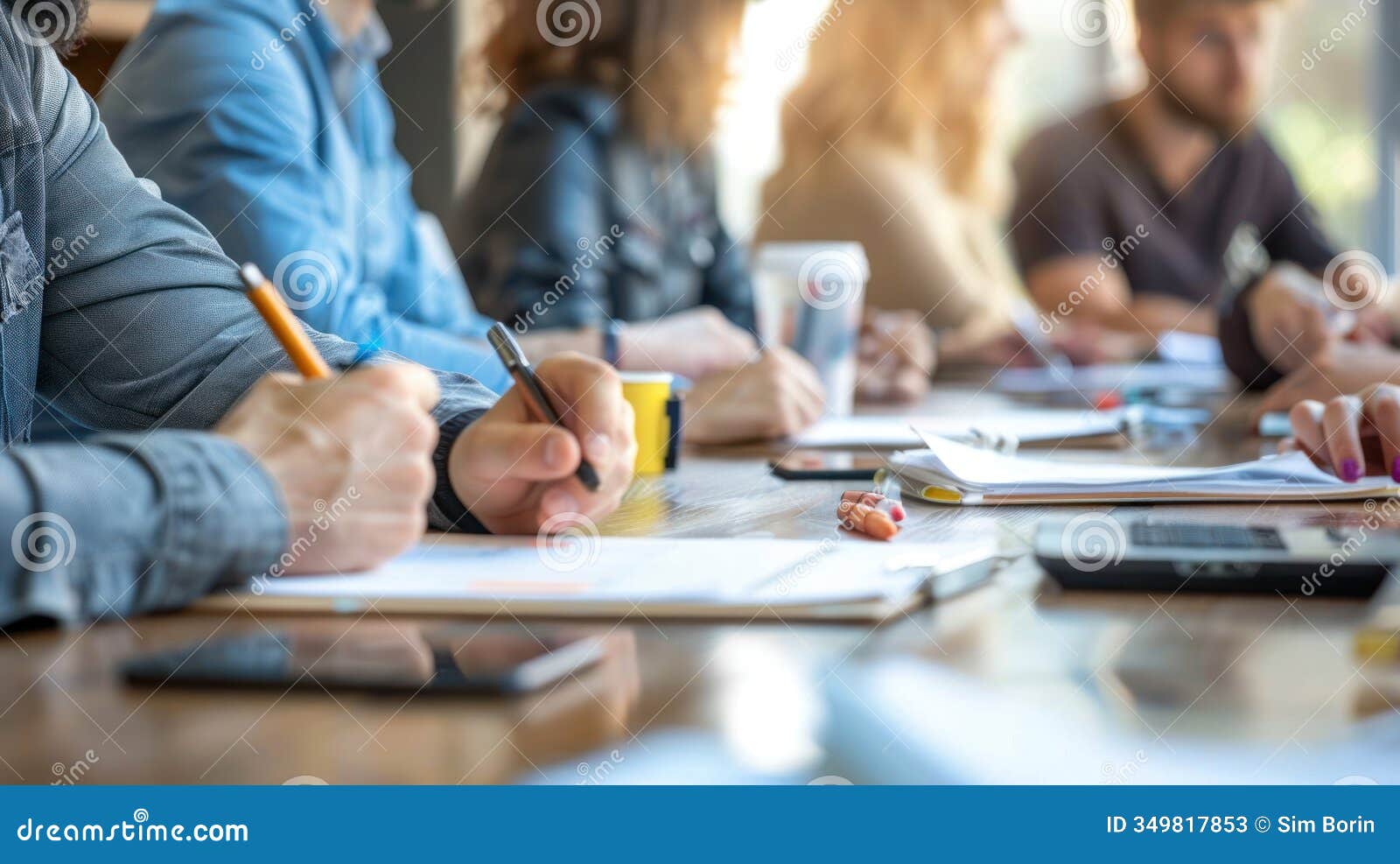 Team Members Giving Feedback on a Presentation Draft during a ...