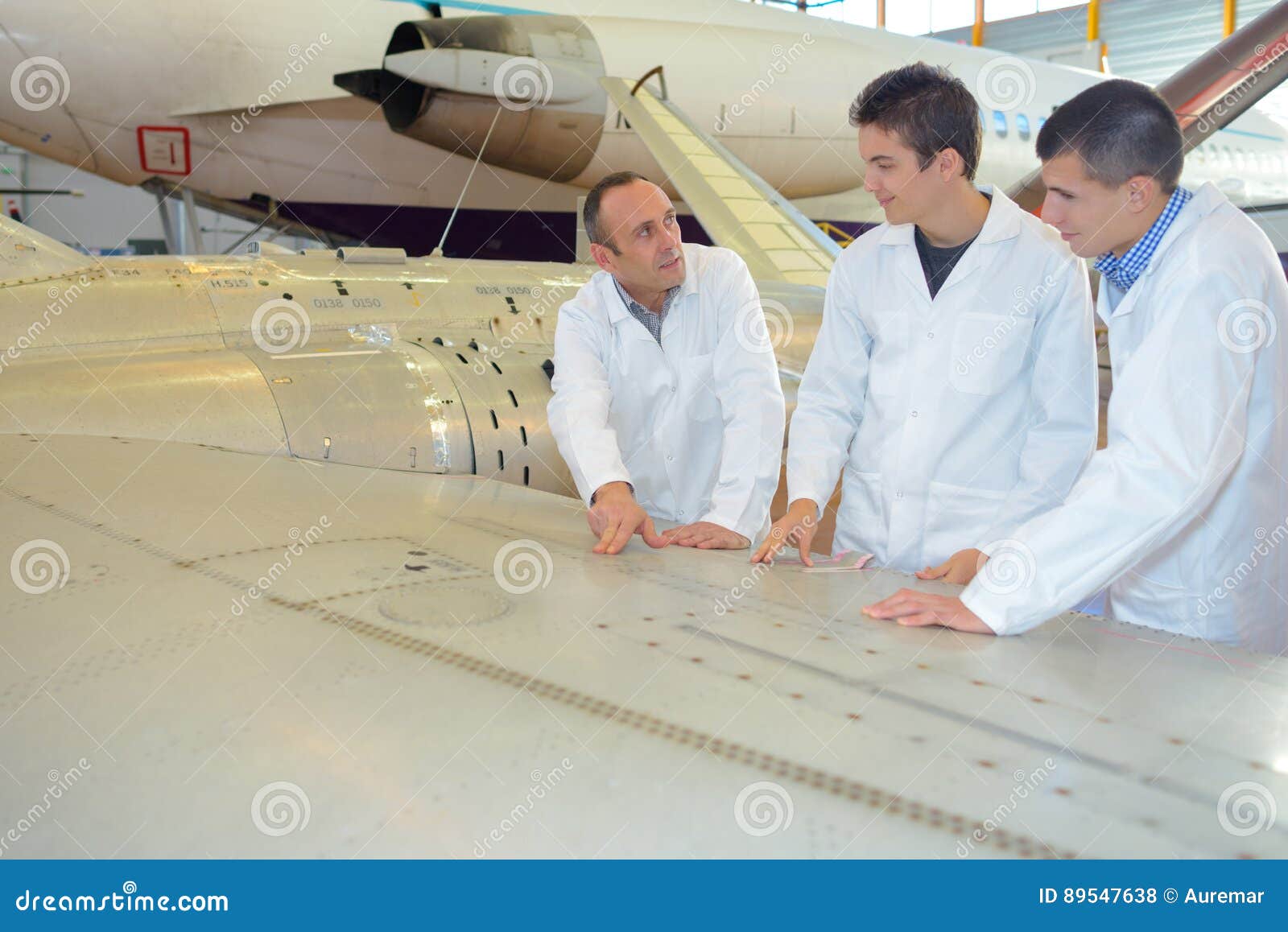 Team Men Looking at Aviation Designs Stock Photo - Image of industry ...
