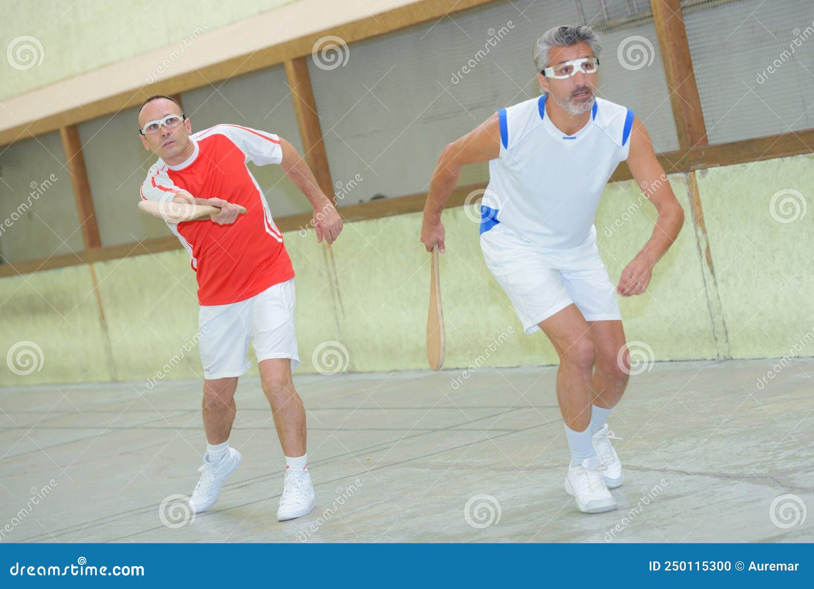 Team men playing pala stock photo. Image of match, racket - 250115300