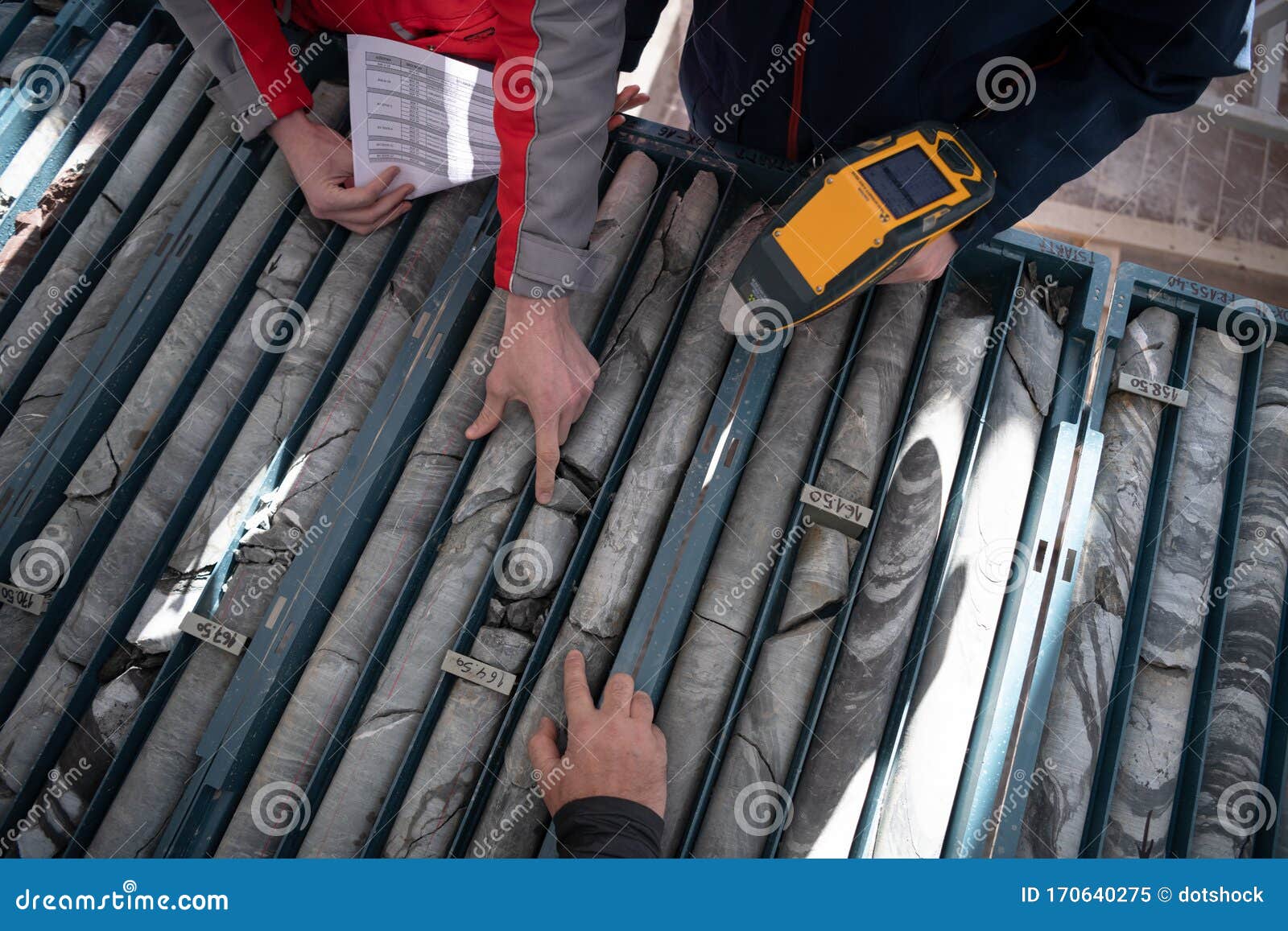 Team of Mining Workers Measuring Drilled Rock Core Stock Image - Image ...
