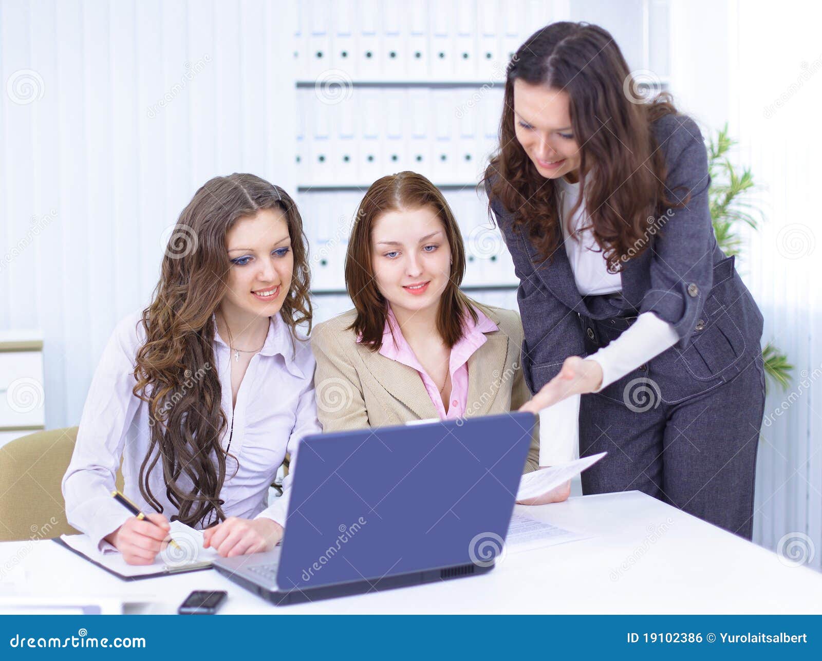 Team) at modern office stock photo. Image of businesspeople - 19102386