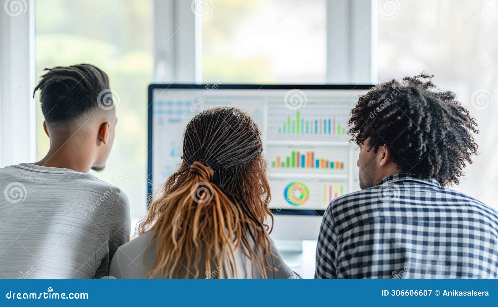Team of Multicultural Young People Looking at the Computer Screen with ...