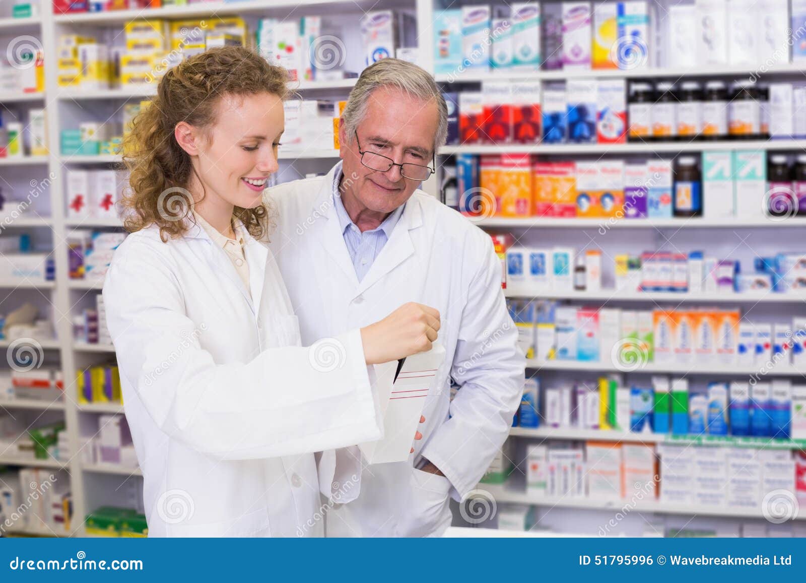 Team of Pharmacist Talking Together about Medication Stock Photo ...