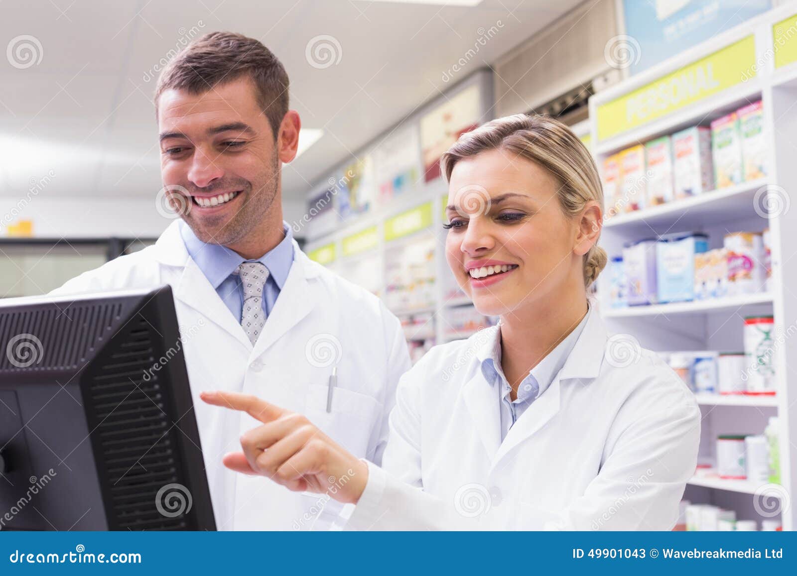 Team of Pharmacists Looking at Computer Stock Image - Image of ...