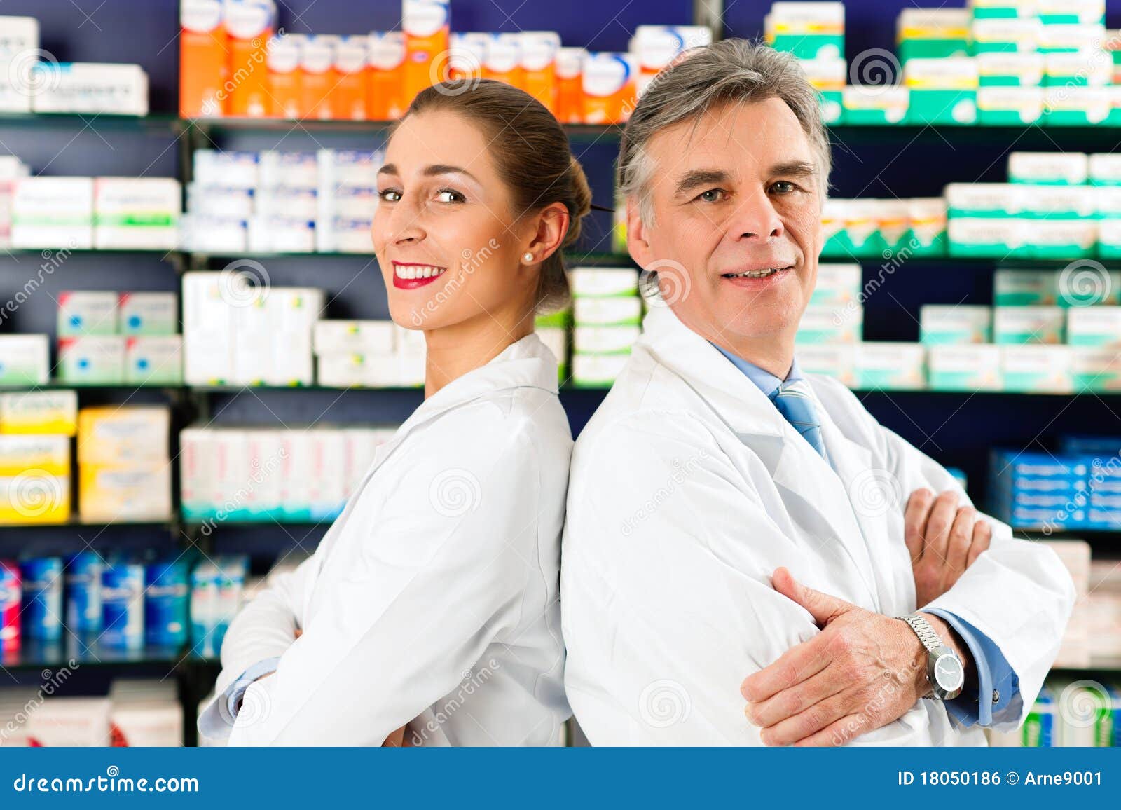 Team of Pharmacists in Pharmacy Stock Photo - Image of folded, retail ...