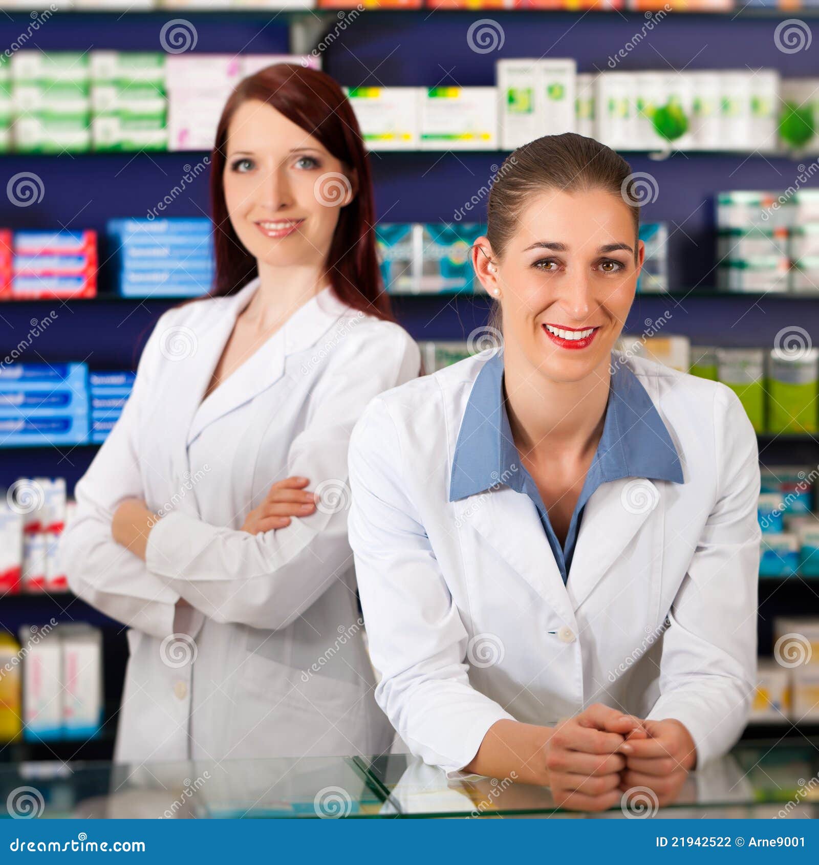 Team of Pharmacists in Pharmacy Stock Photo - Image of shelves ...