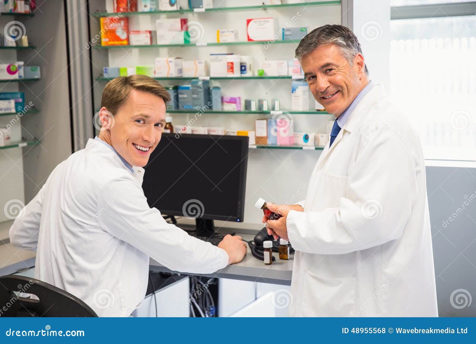 Team of Pharmacists Using the Computer Stock Photo - Image of medical ...