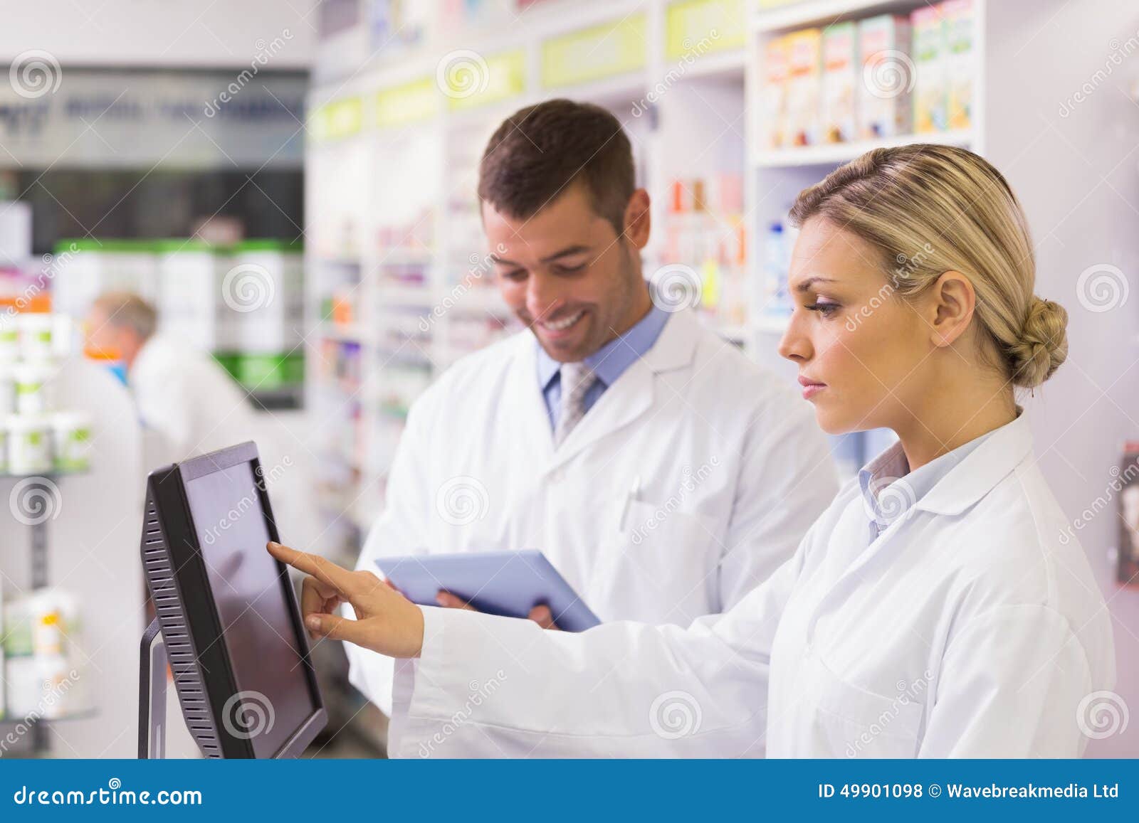Team of Pharmacists Using Computer Stock Photo - Image of concentrating ...