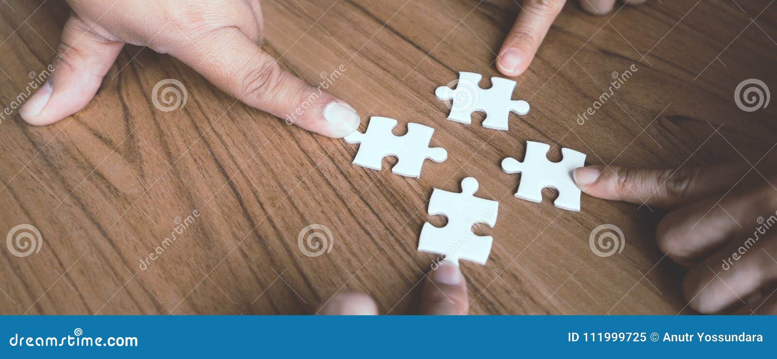 Team Placing Four Jigsaw Together for Team Concept Stock Image - Image ...