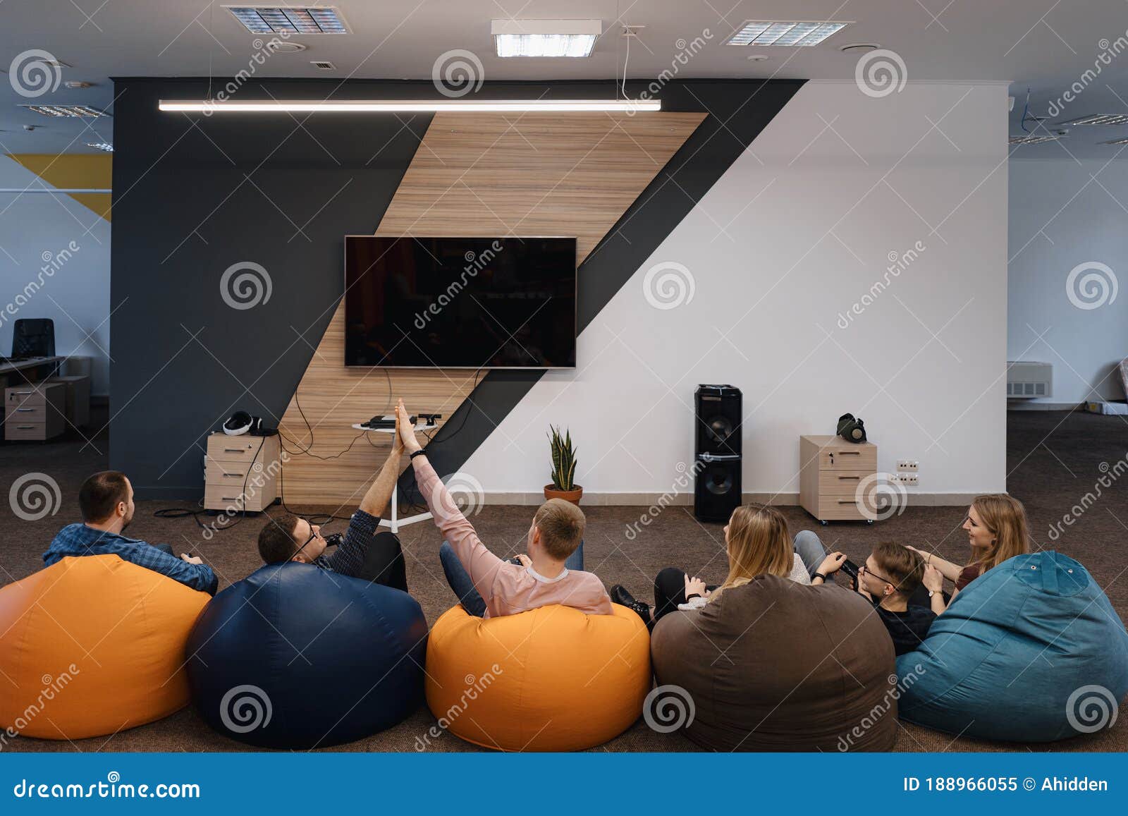 An it Team Play Video Games on the Console while Relaxing after Work ...